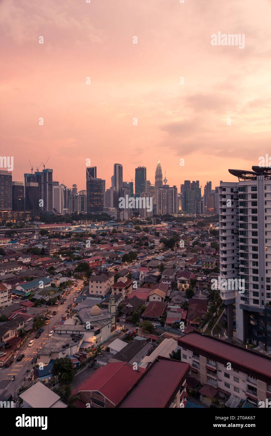 View over Kampung Datuk Keramat during sunset with Kuala Lumpur city ...