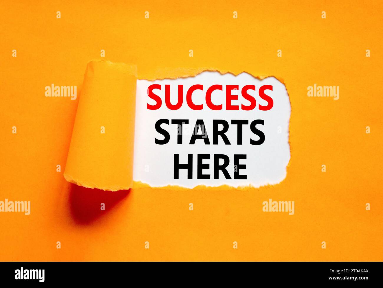 Success starts here symbol. Concept word Success starts here on beautiful white paper. Beautiful ...