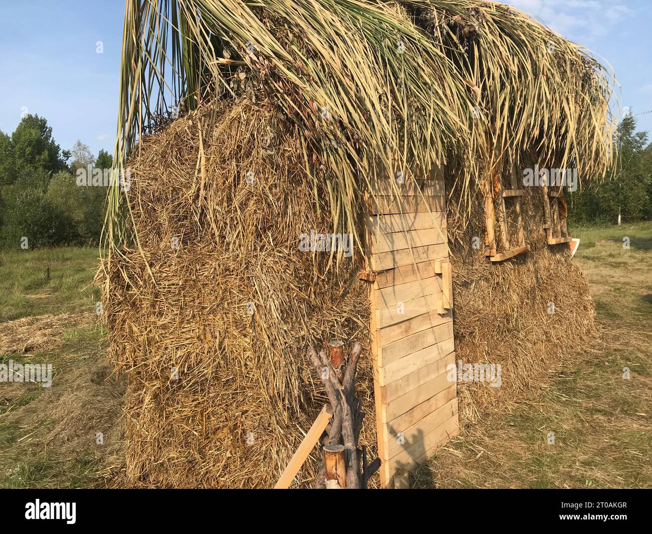 House of straw and grass with wooden elements. Temporary decorations ...