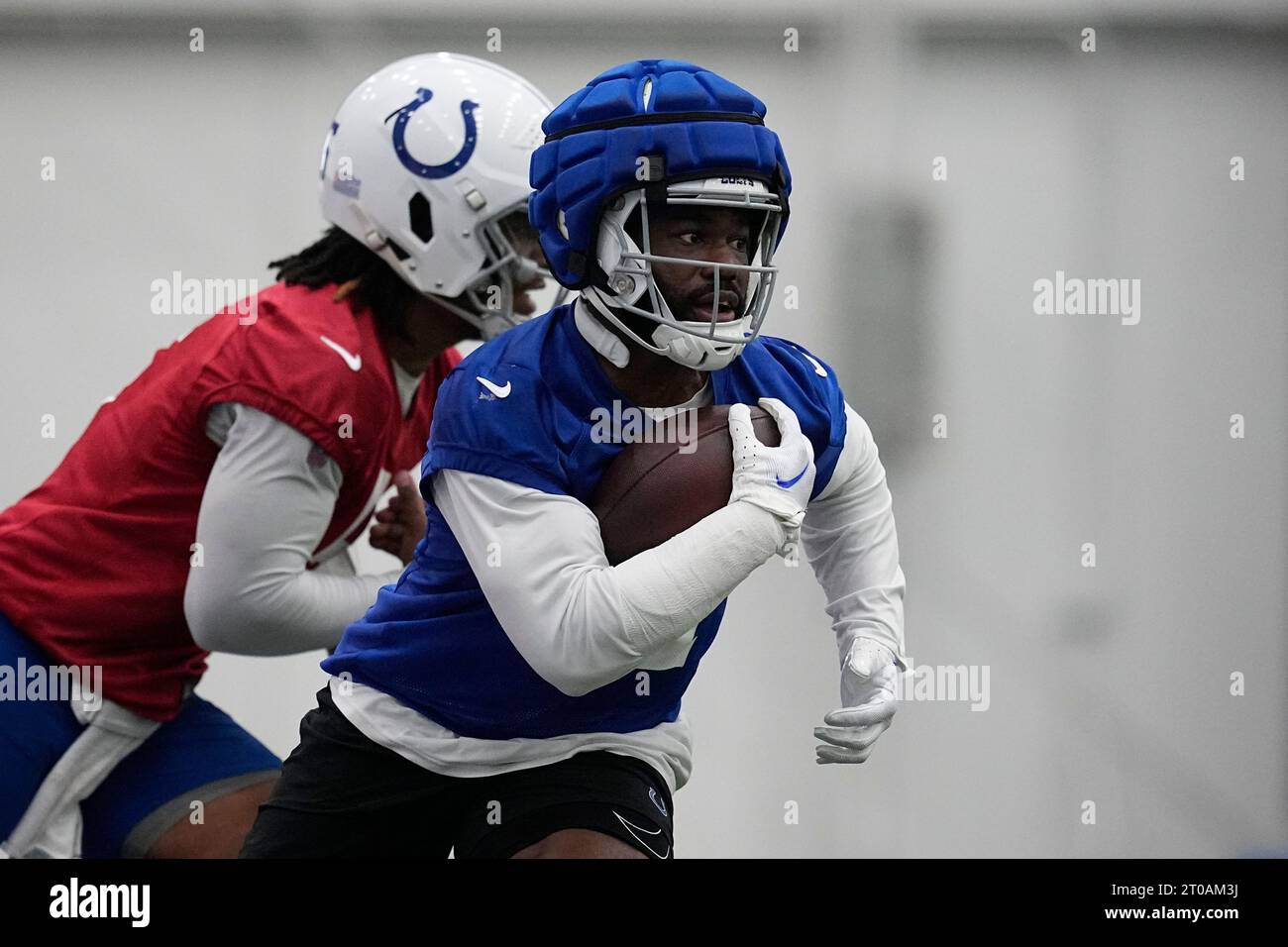 Indianapolis Colts' Zack Moss runs a drill during an NFL football ...