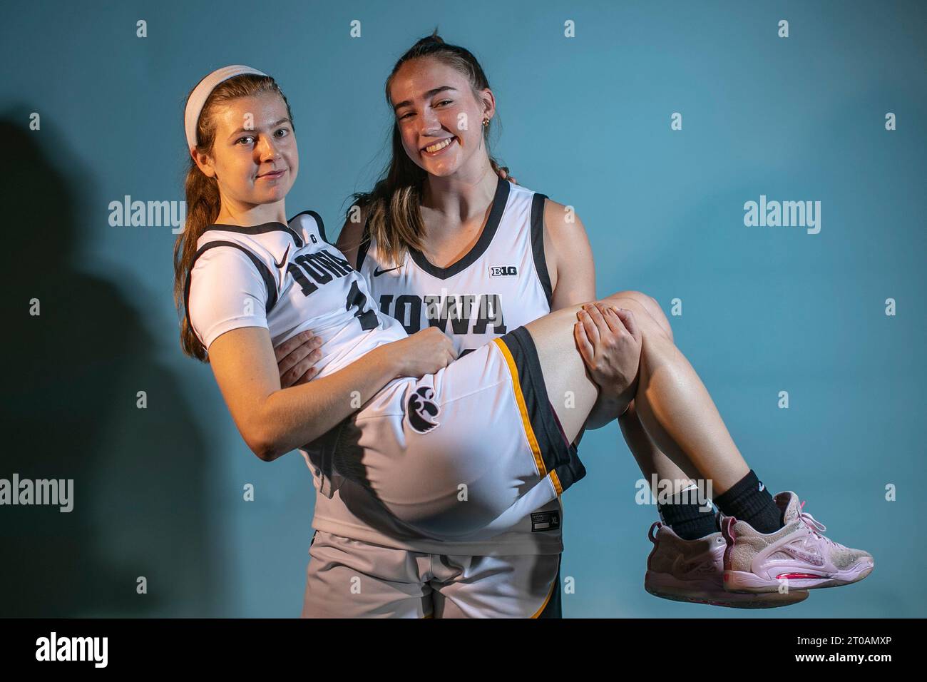 Iowa Hawkeyes guard Molly Davis (1) and forward AJ Ediger (34) poses ...