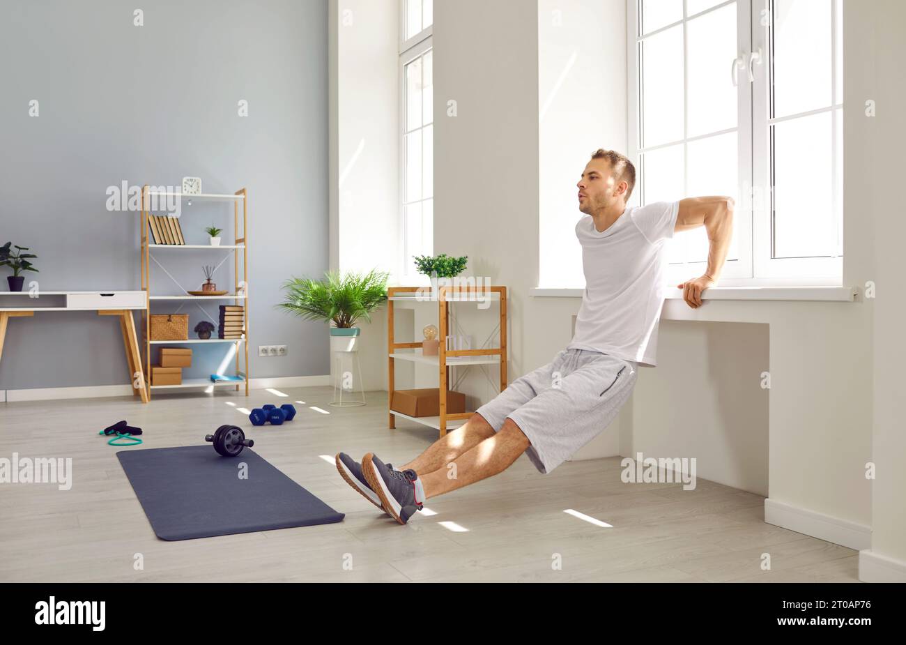 Triceps dip exercise man home hi-res stock photography and images - Alamy
