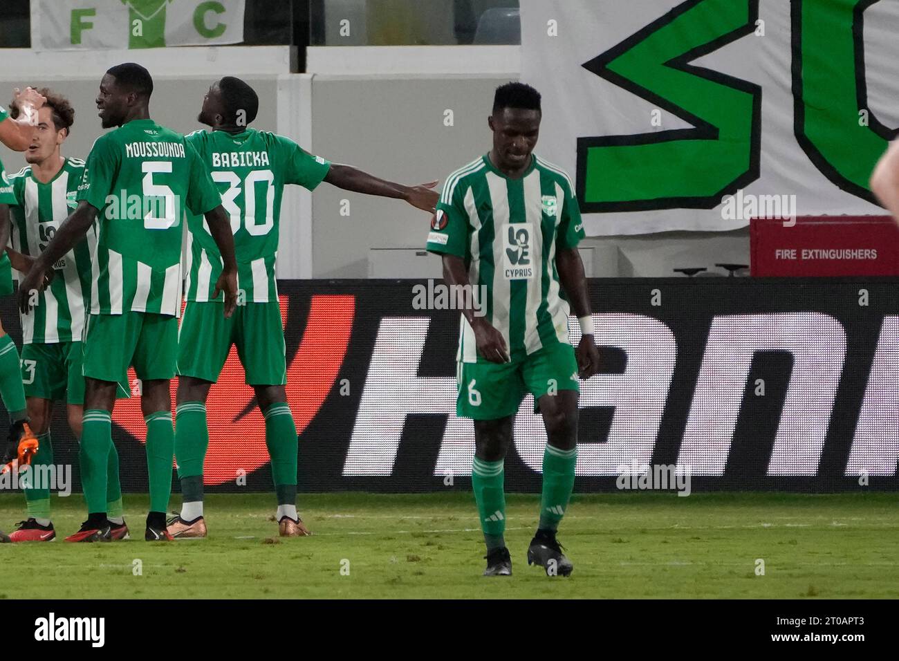 Aris' Shavy Babicka, center, celebrates after scoring against Rangers ...
