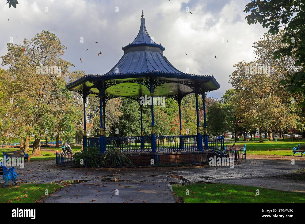 The Victorian bandstand and falling autumn leaves, at Victoria Park ...