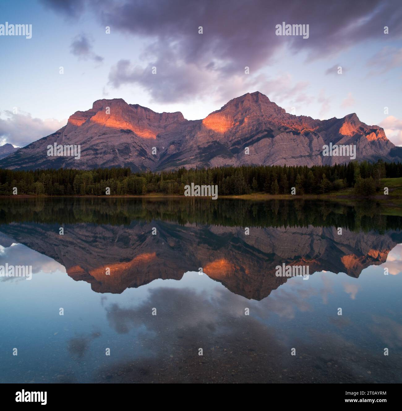 Mount Kidd at Sunrise reflected in Wedge Pond in Kananaskis, Alberta ...
