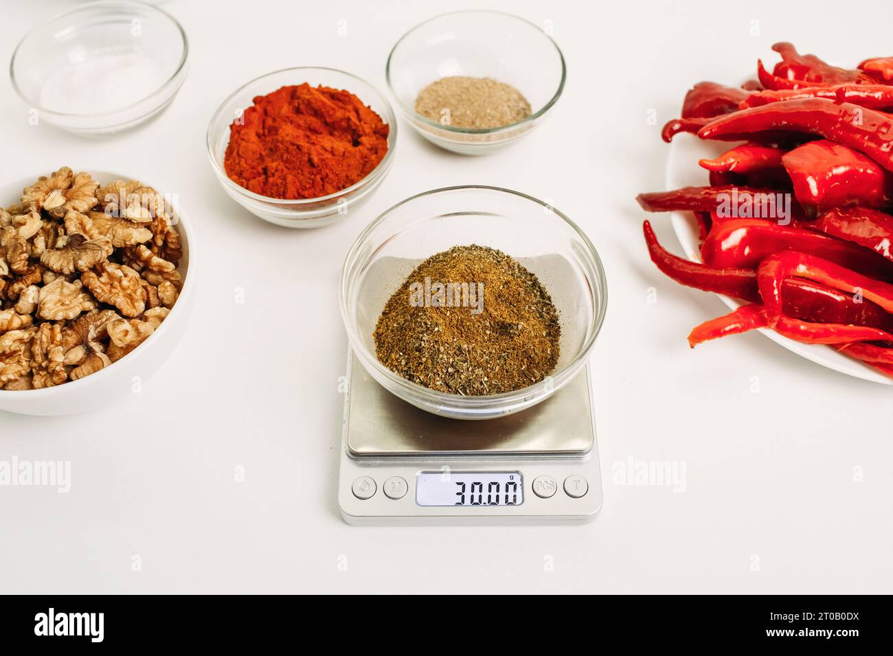 Weighing portions of ingredients to prepare a dish. There is a mixture ...