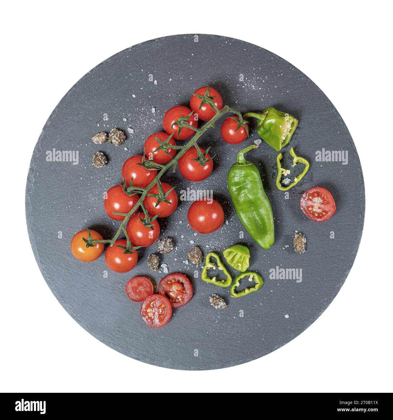 Tomatoes peppers on table Cut Out Stock Images & Pictures - Alamy