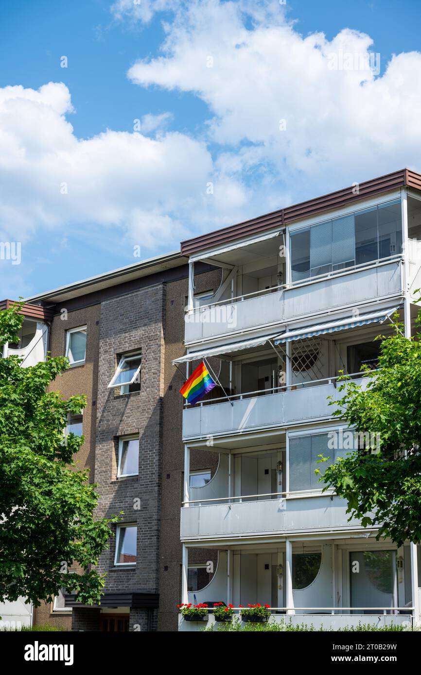 Rainbow flag on an apartment balcony Stock Photo - Alamy