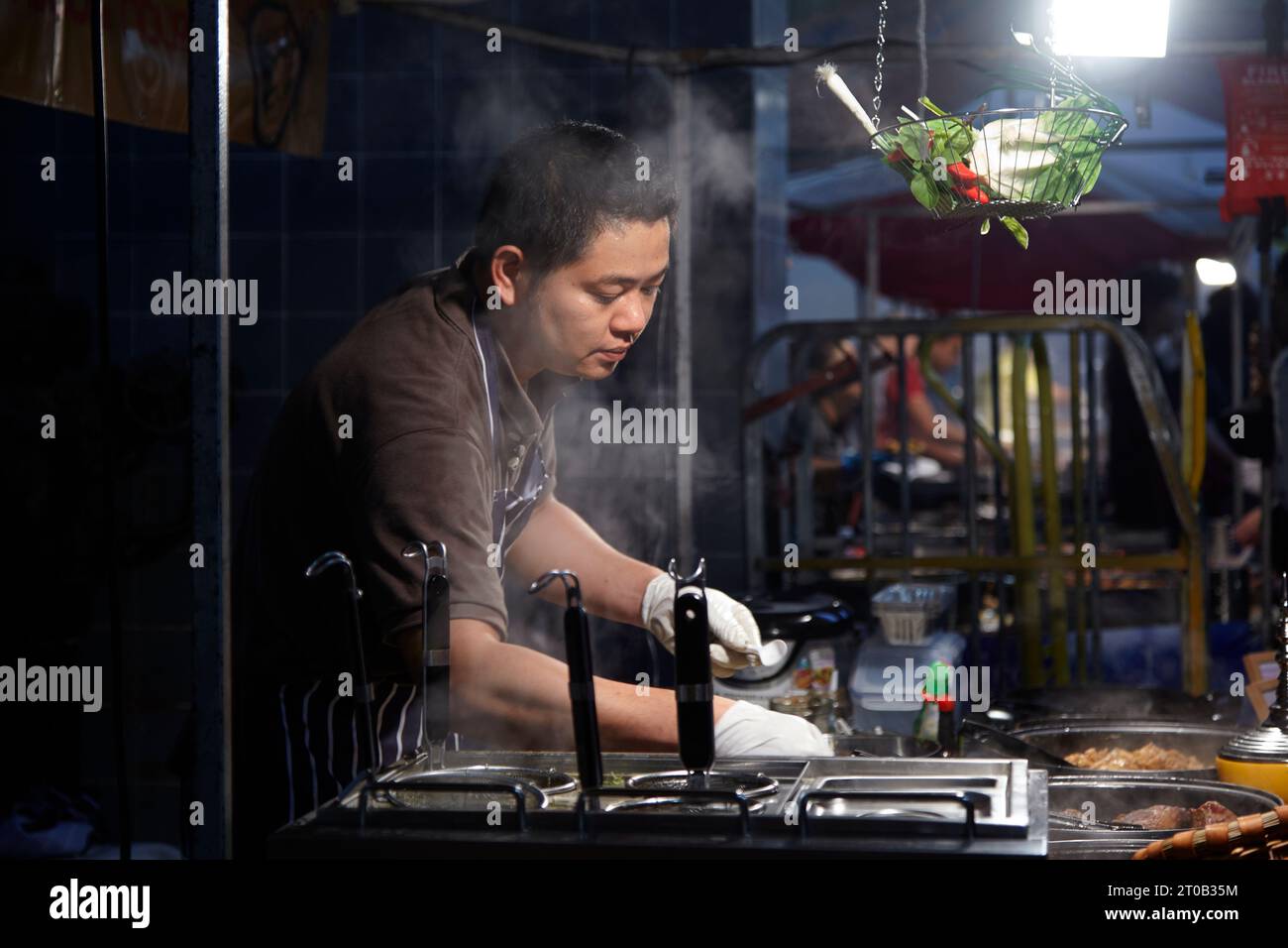 Cook in Soho, London Stock Photo - Alamy