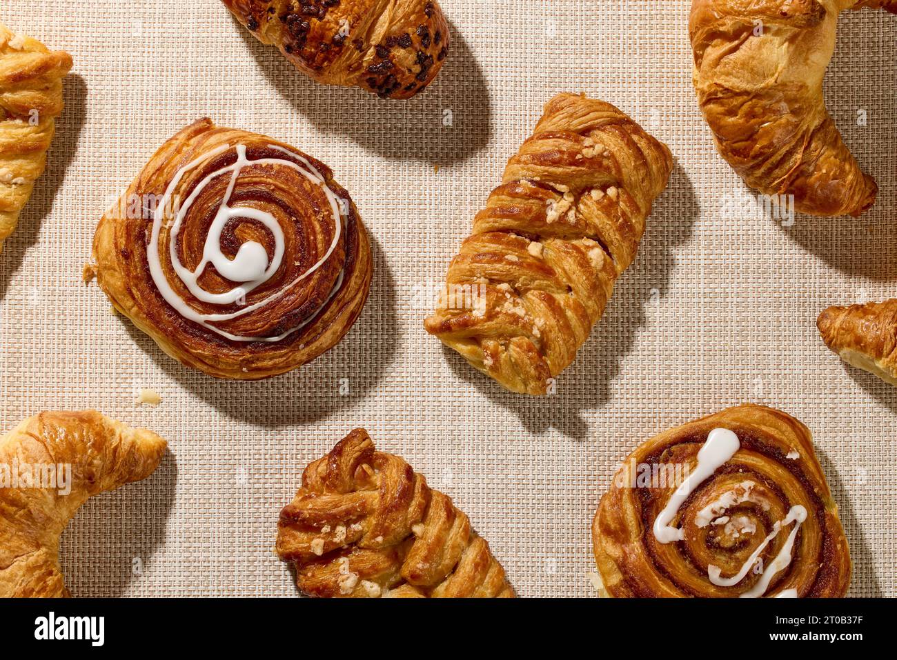 assorted pastries on a table, top view Stock Photo - Alamy