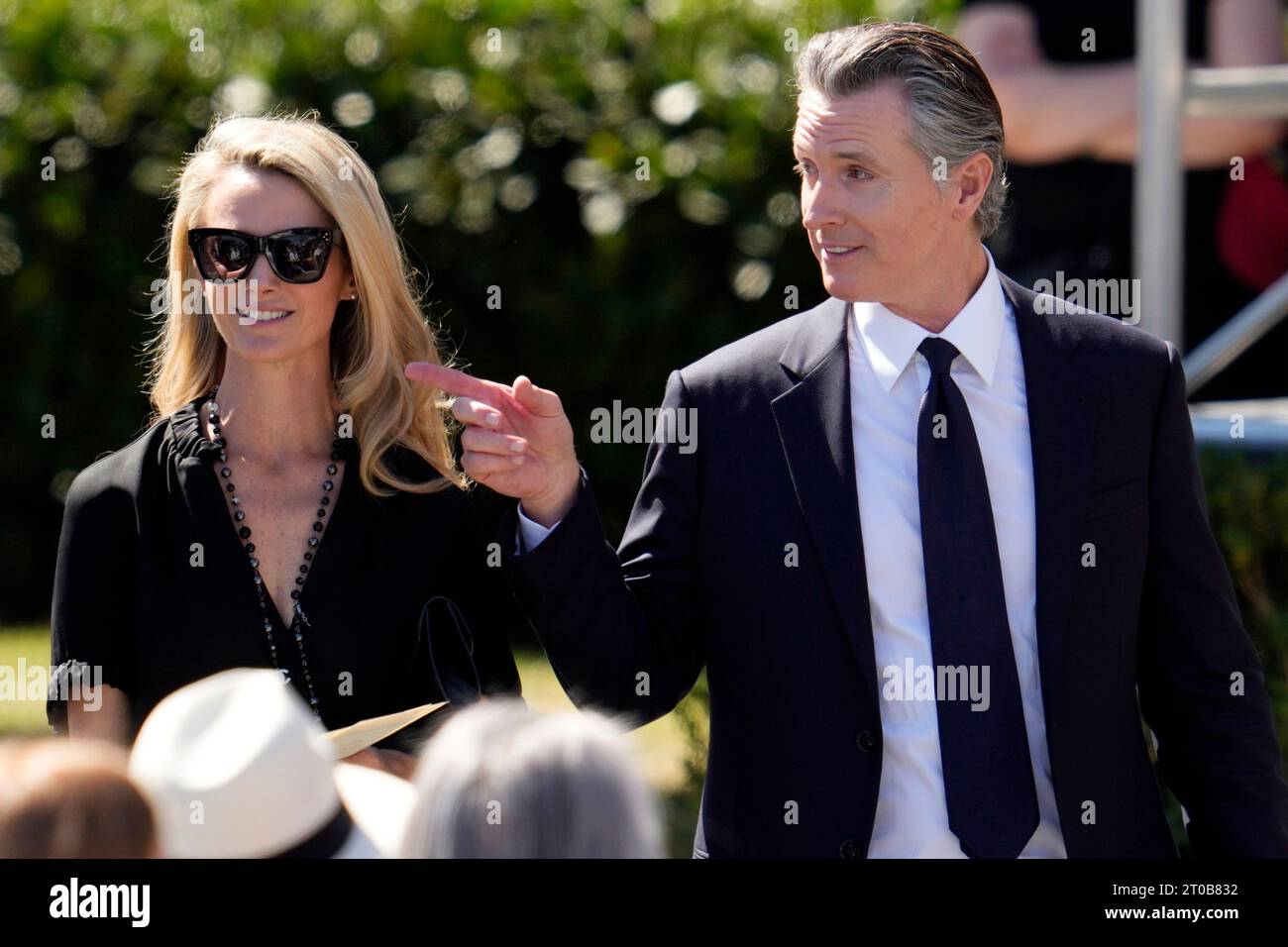 Gov. Gavin Newsom, right, arrives with his wife, first partner Jennifer ...