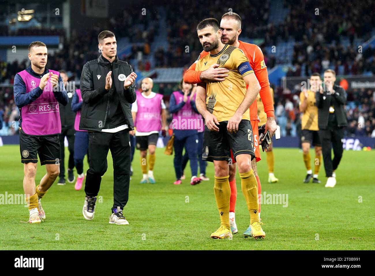 HSK Zrinjski's Slobodan Jakovljevic (centre) is consoled by team-mate ...