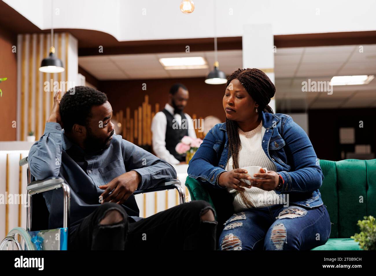 Handicapped travel. Young African American man on wheelchair waiting ...
