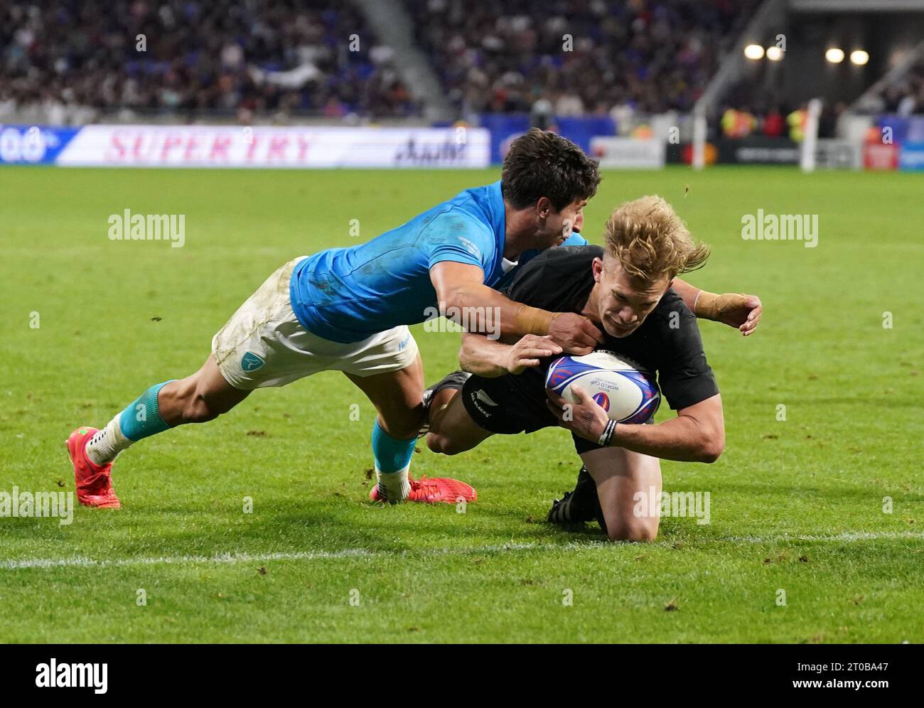 New Zealand's Damian Mckenzie scores a try during the Rugby World Cup ...
