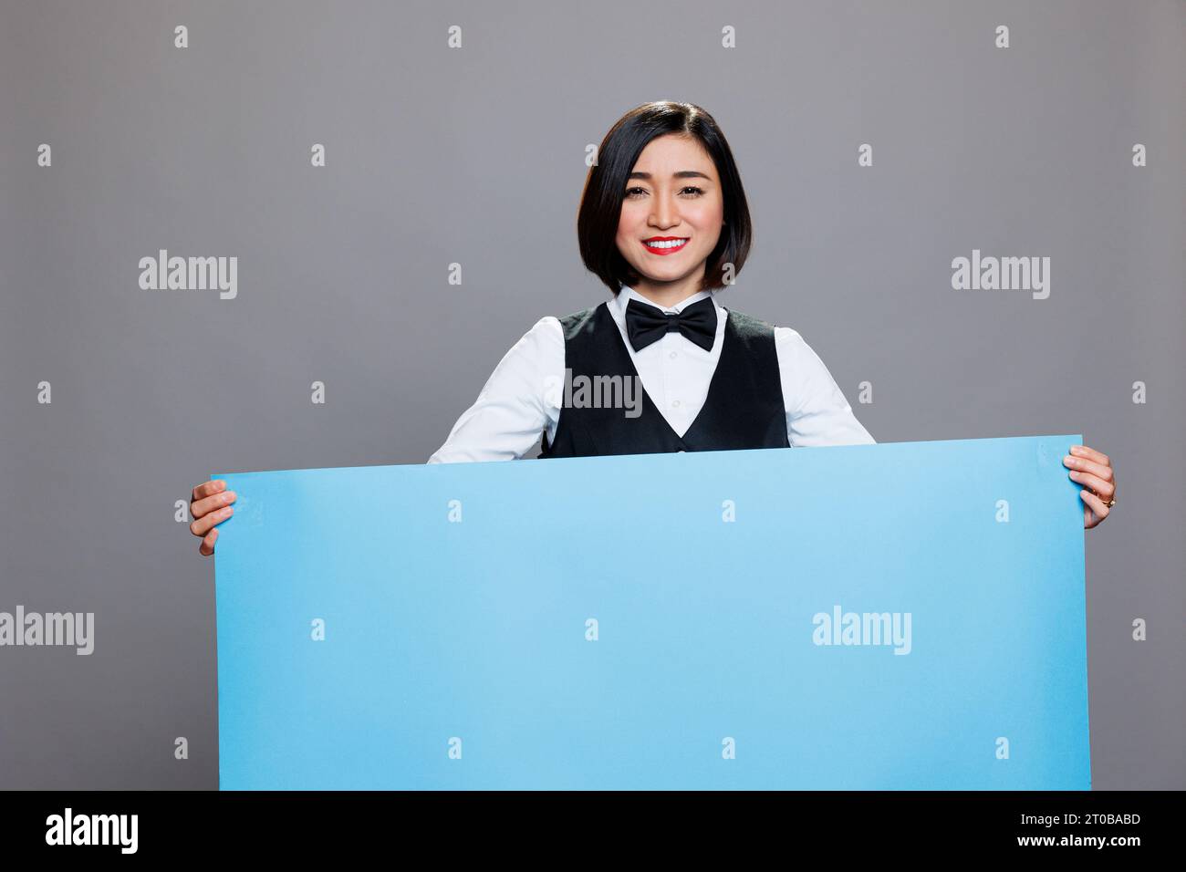 Asian waiter holding paper hi-res stock photography and images - Alamy