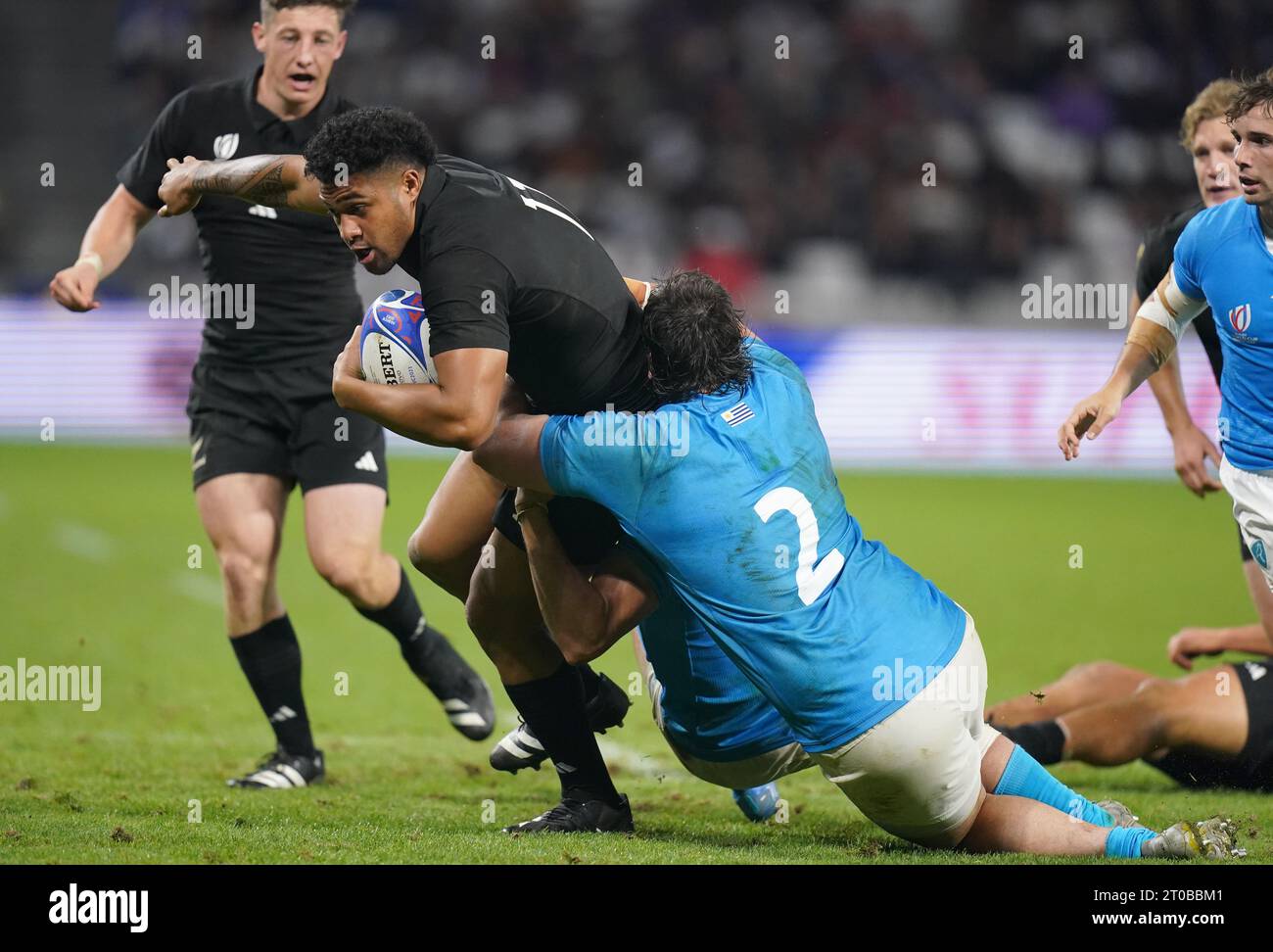 New Zealand's Leicester Fainga'anuku is tackled by German Kessler ...