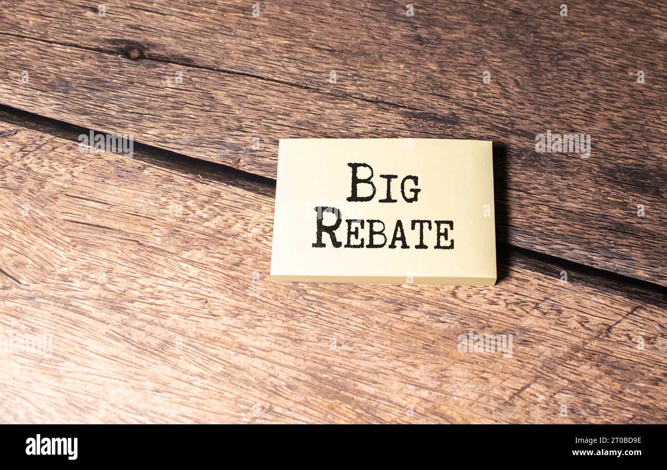 Business concept. On a white background is a shopping cart with a sign ...