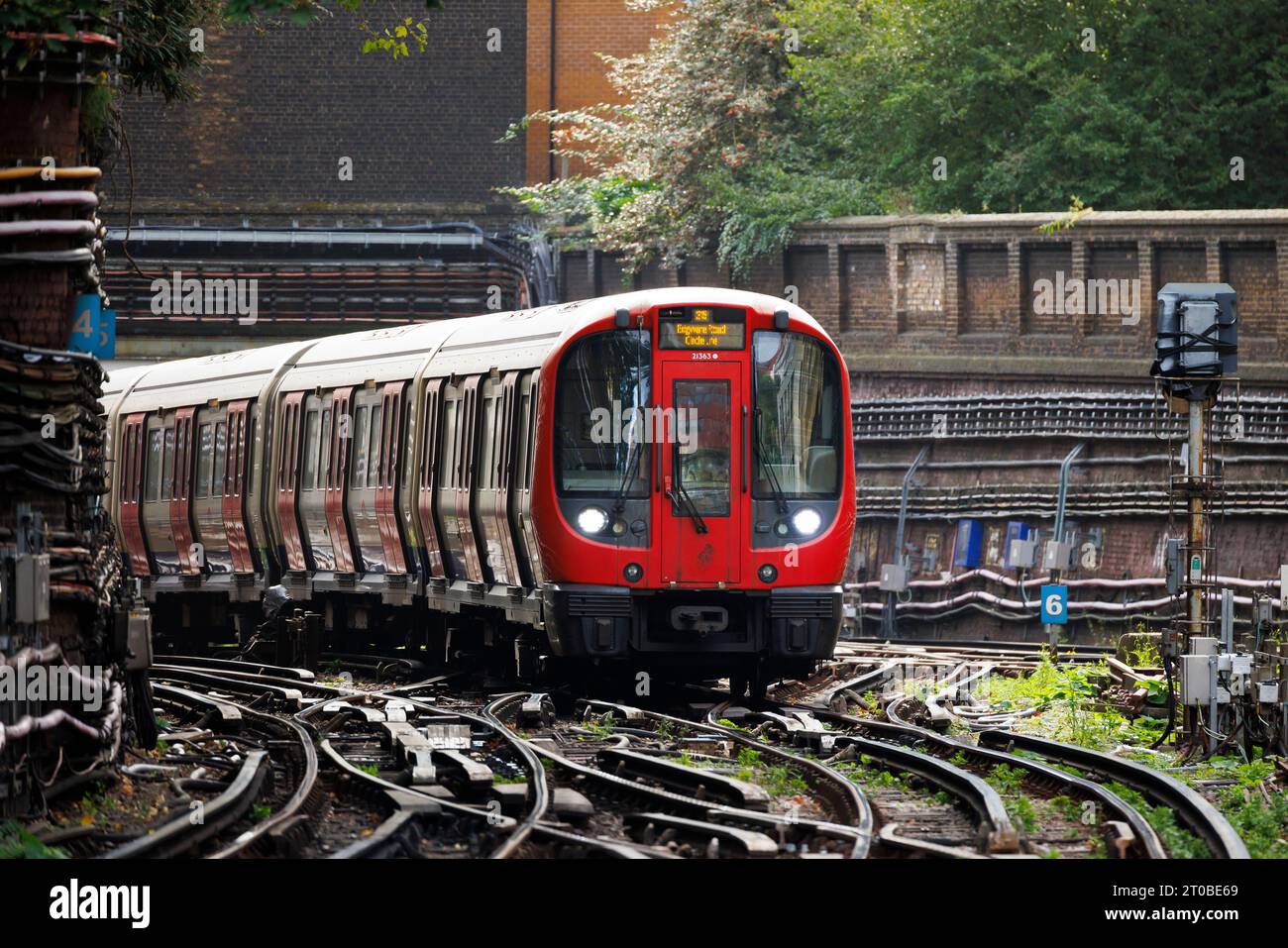 A Circle Line S7 tube train crosses points as it approaches the ...