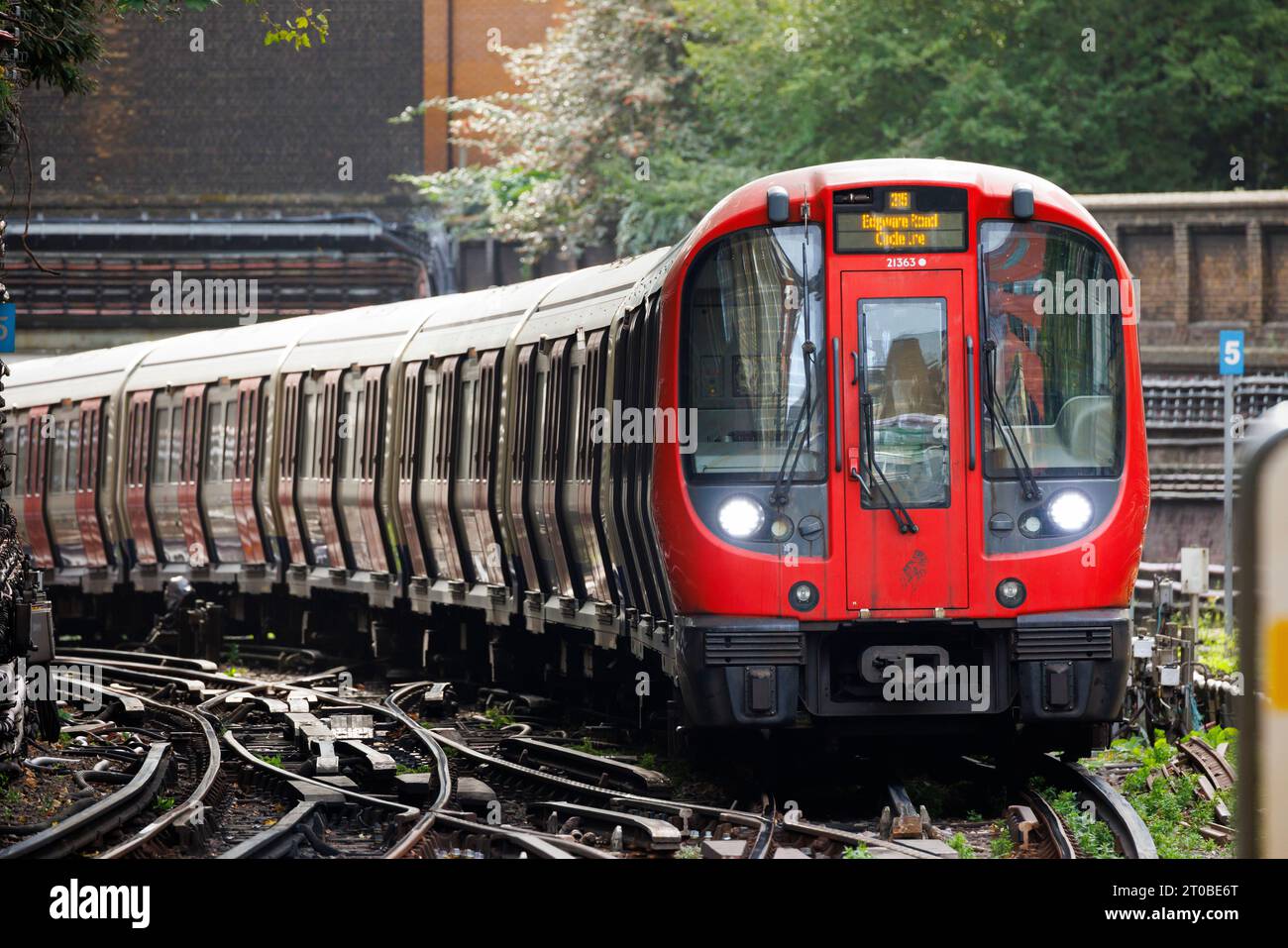 A Circle Line S7 tube train crosses points as it approaches the ...