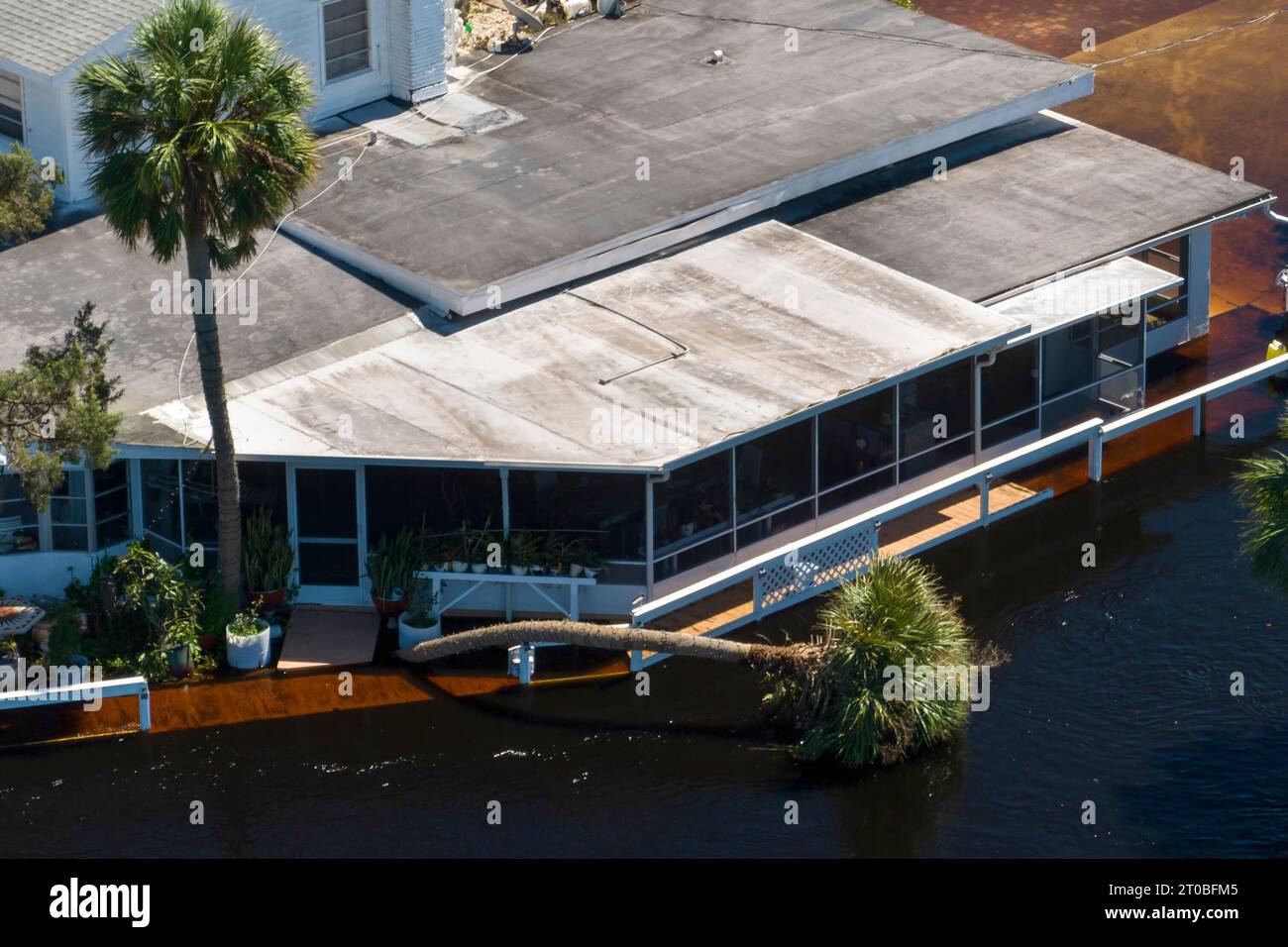 Aftermath of natural disaster. Surrounded by hurricane rainfall flood ...