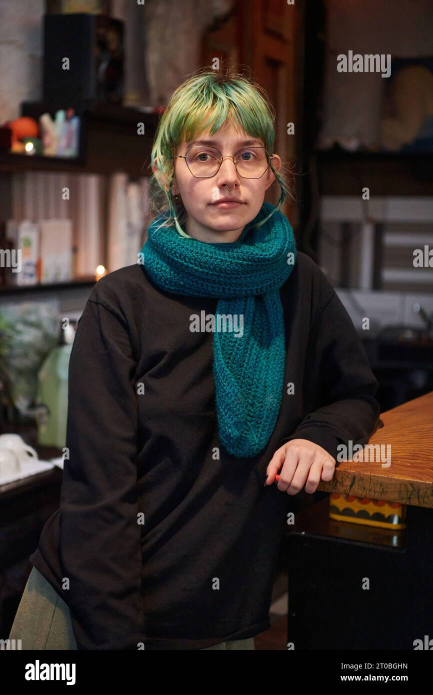 A Modern And Intriguing Girl With Striking Blue Hair Enjoys A Night Out