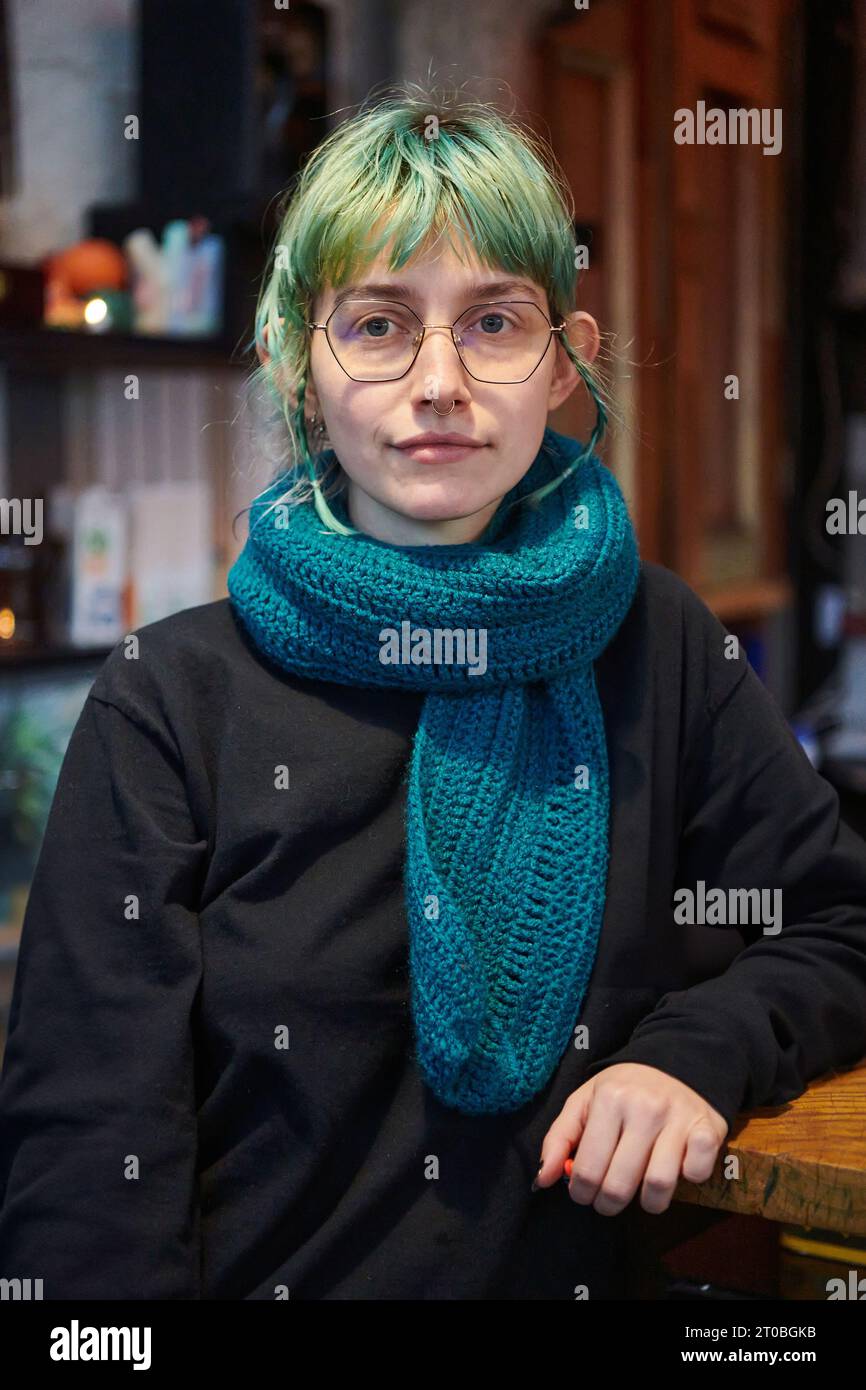A Modern And Intriguing Girl With Striking Blue Hair Enjoys A Night Out