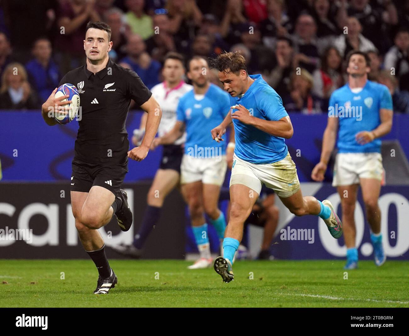 New Zealand's Will Jordan runs for a tryduring the Rugby World Cup 2023 ...
