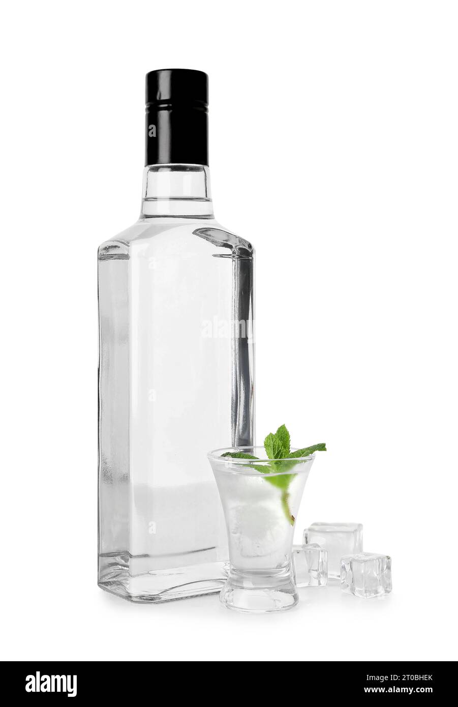 Bottle and glass of vodka isolated on white background Stock Photo - Alamy