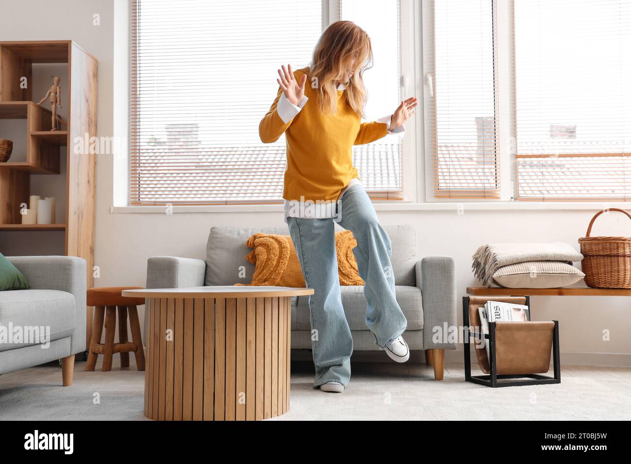 Scared mature woman at home Stock Photo - Alamy