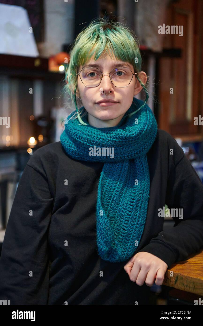 A Modern And Intriguing Girl With Striking Blue Hair Enjoys A Night Out