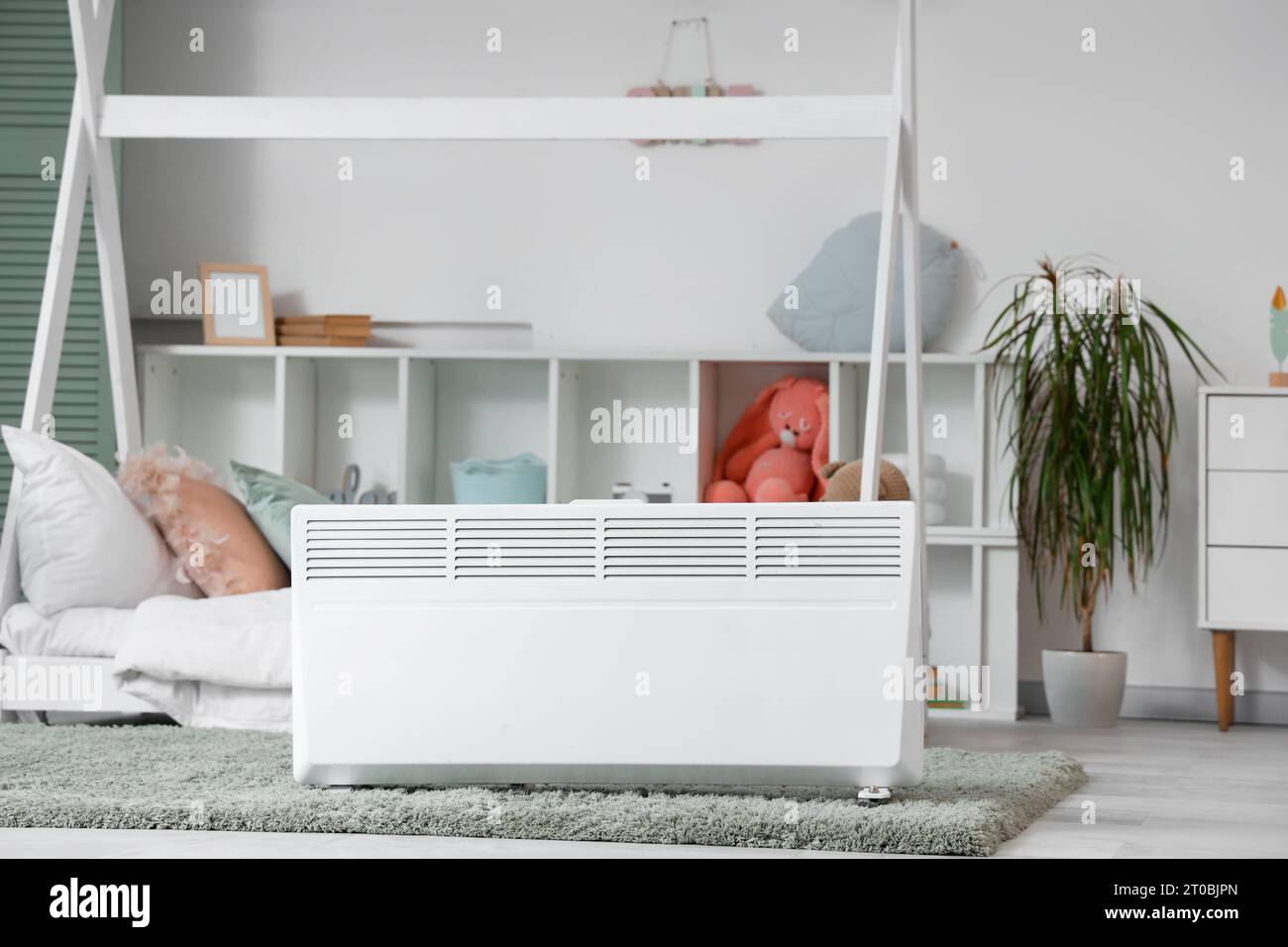 Modern radiator in children's bedroom Stock Photo - Alamy