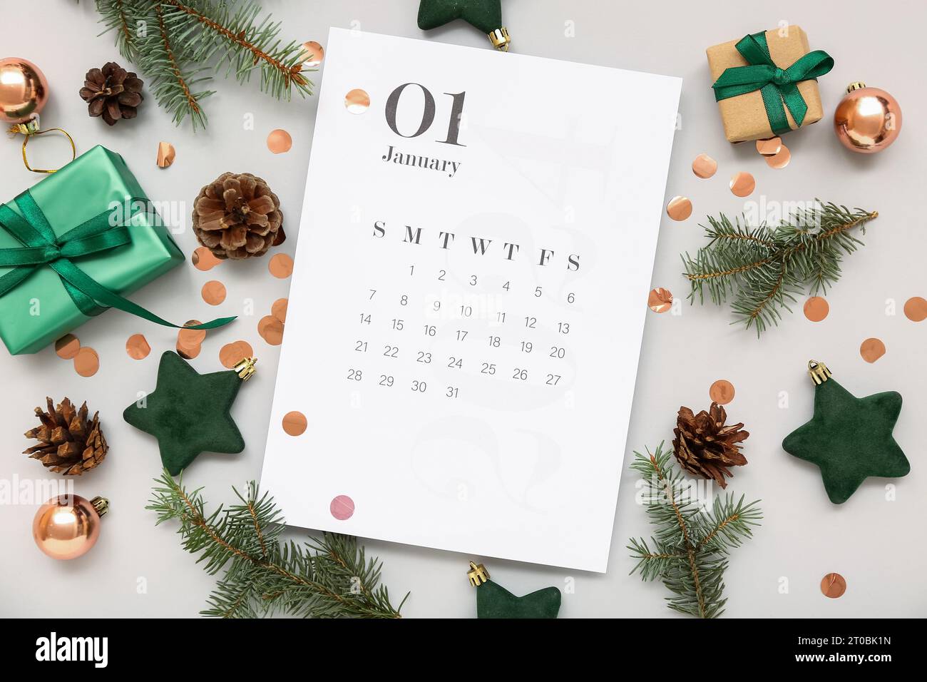 Paper calendar for January 1 with gift boxes and Christmas decorations ...