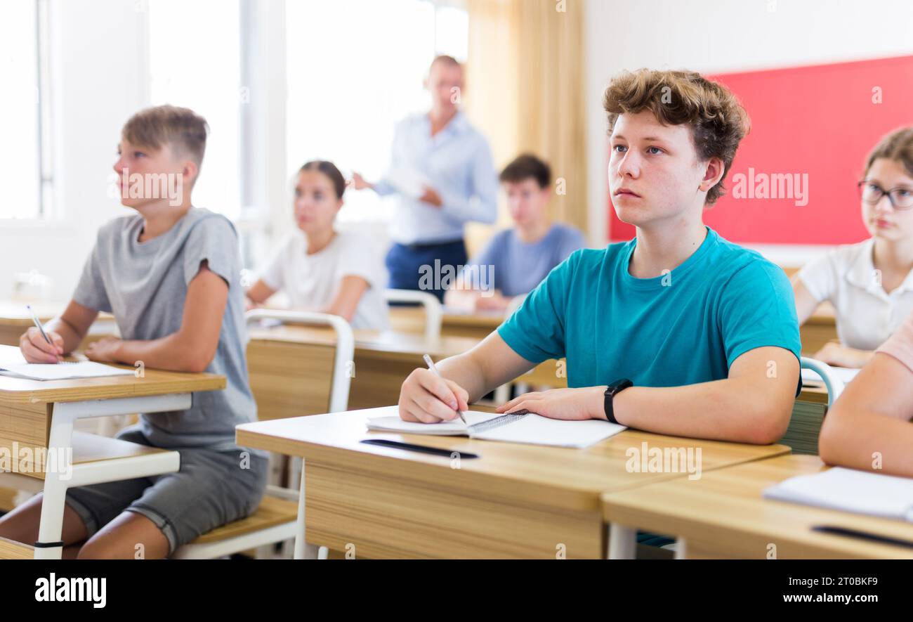 Student is sitting test and answer about task in classroom Stock Photo ...
