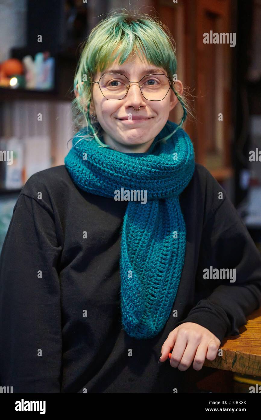 A Modern And Intriguing Girl With Striking Blue Hair Enjoys A Night Out