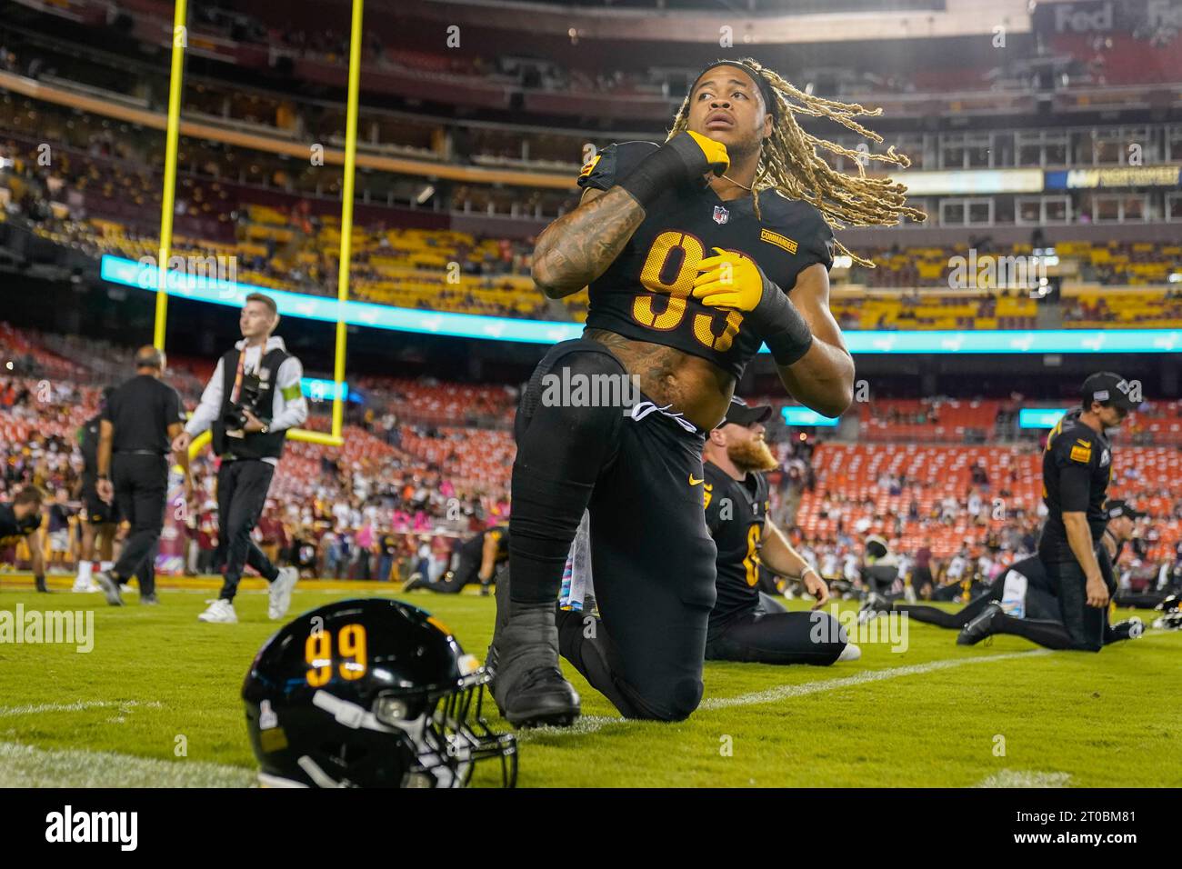 Washington Commanders defensive end Chase Young (99) warming up before ...