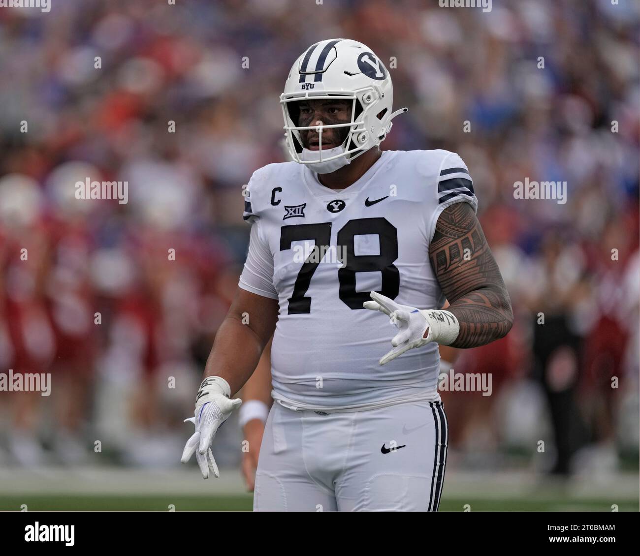 BYU offensive lineman Kingsley Suamataia gets into position during the ...