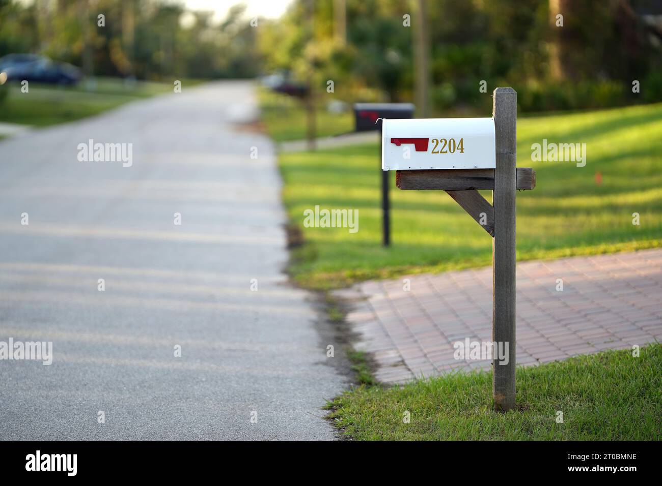 Typical american outdoors mail box on suburban street side Stock Photo ...