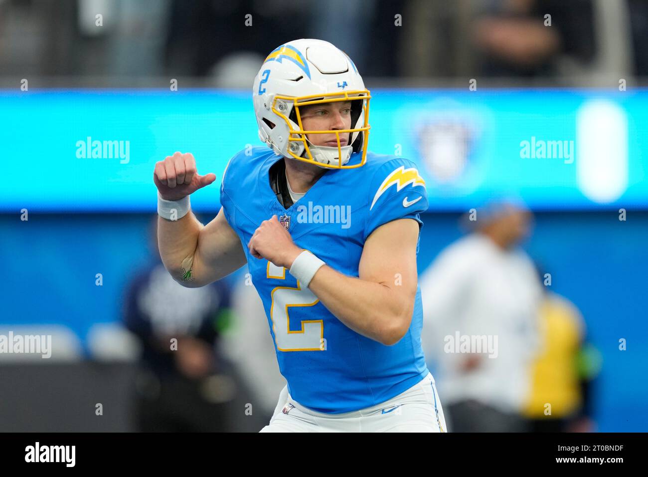 Los Angeles Chargers quarterback Easton Stick (2) warms up before an ...