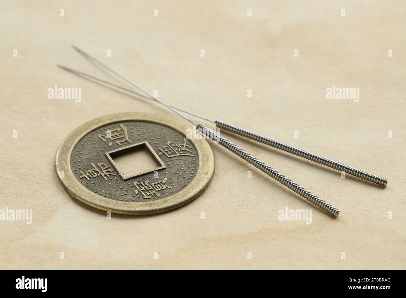 Acupuncture needles antique chinese coin hi-res stock photography and ...