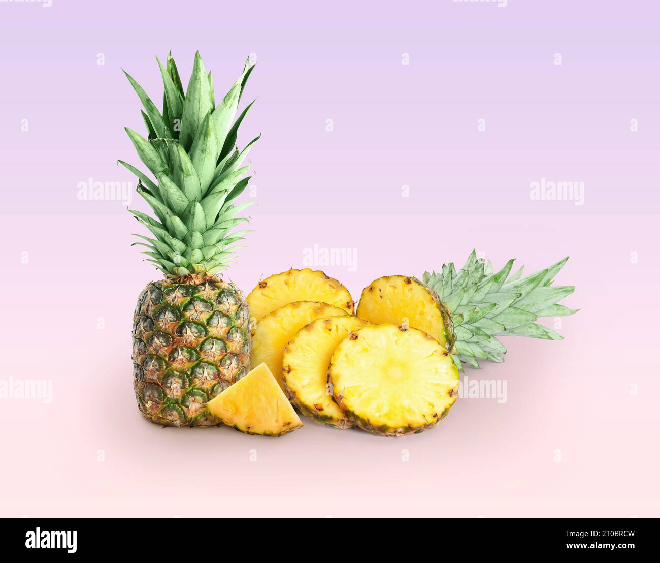 Cut and whole pineapples color gradient background Stock Photo - Alamy