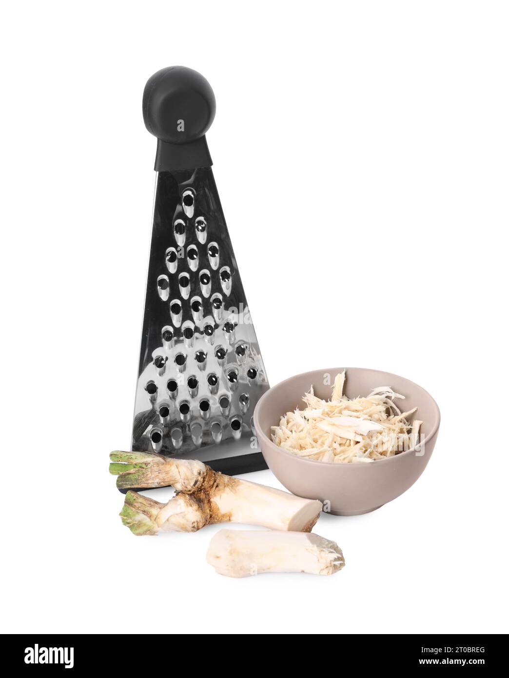 Bowl with grated horseradish, cut root and grater isolated on white ...