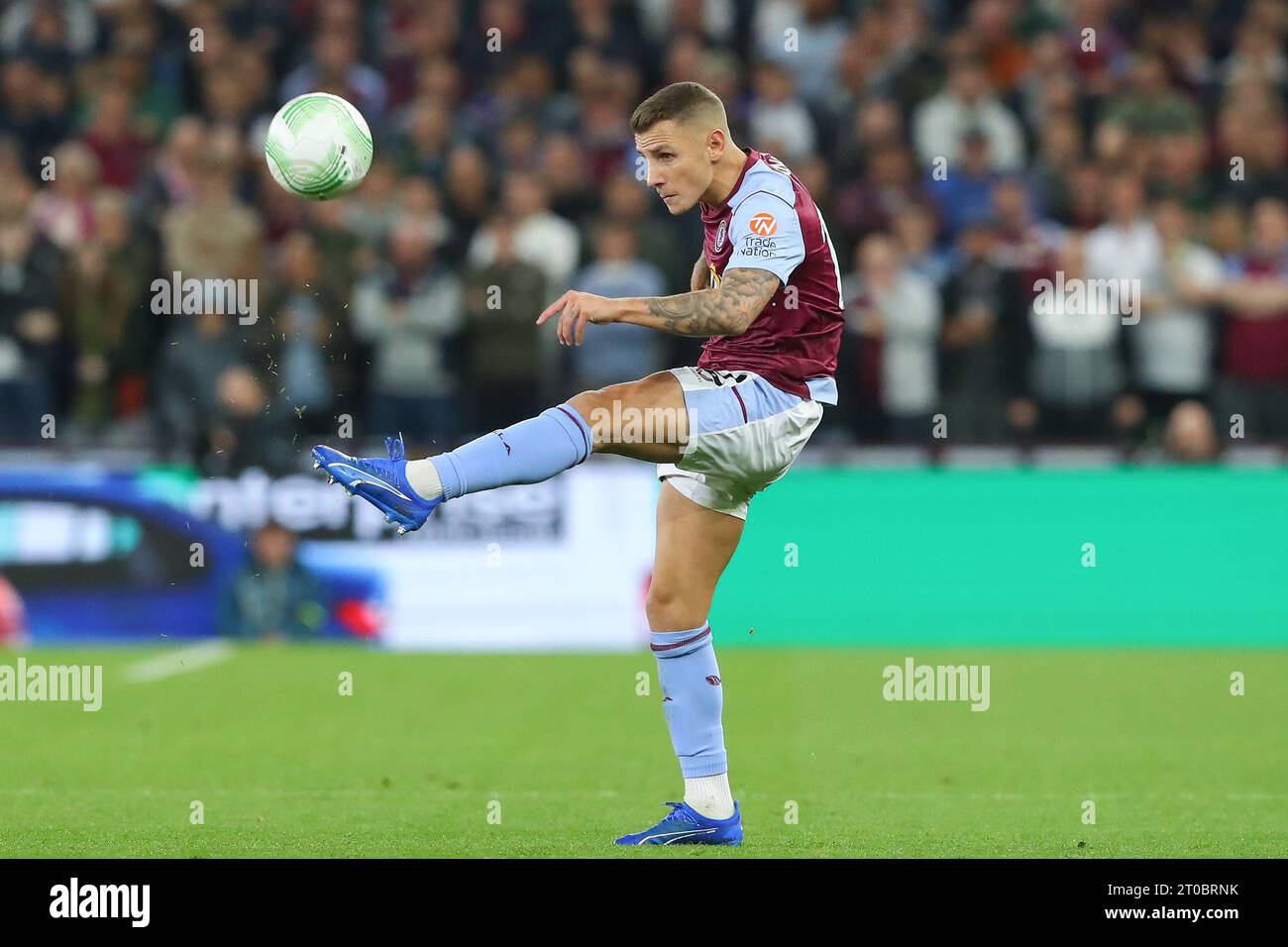Lucas Digne #12 of Aston Villa passes the ball during the UEFA Europa Conference League match ...