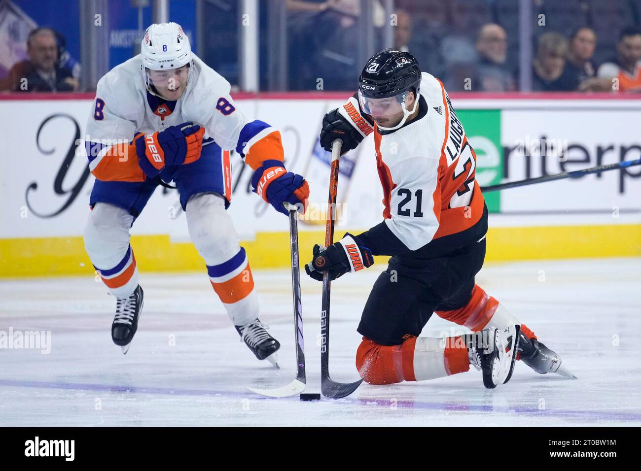 Philadelphia Flyers' Scott Laughton, right, and New York Islanders ...