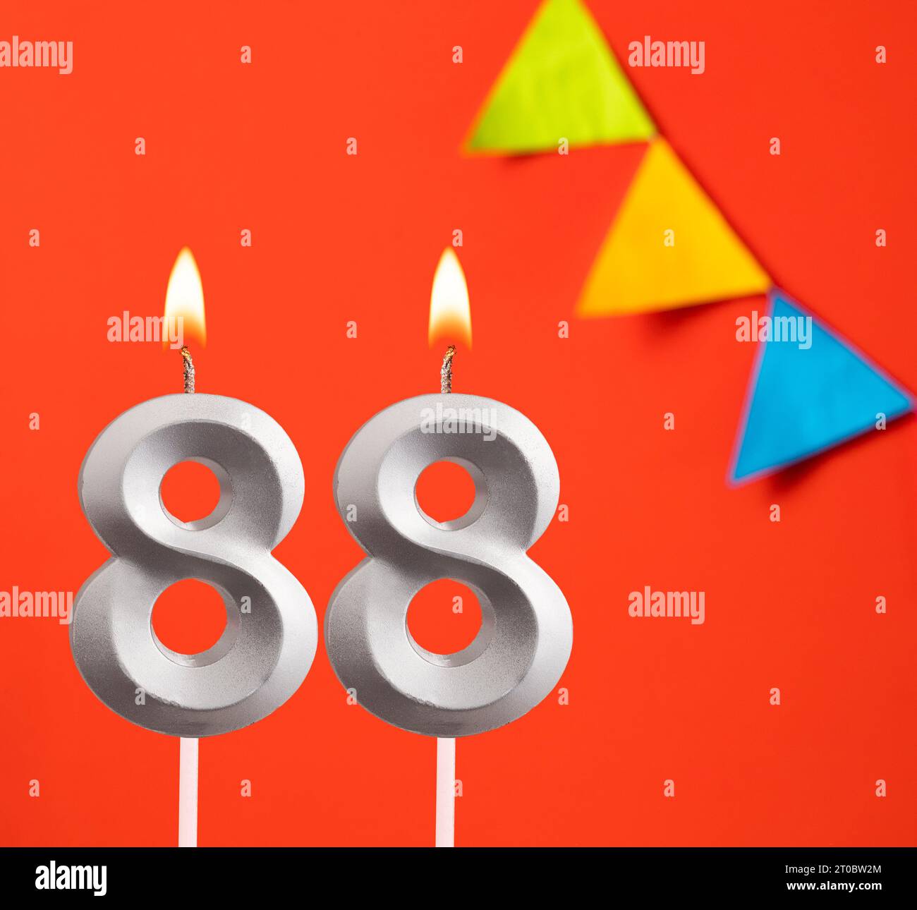 Birthday card - Number 88 candle in orange background Stock Photo - Alamy