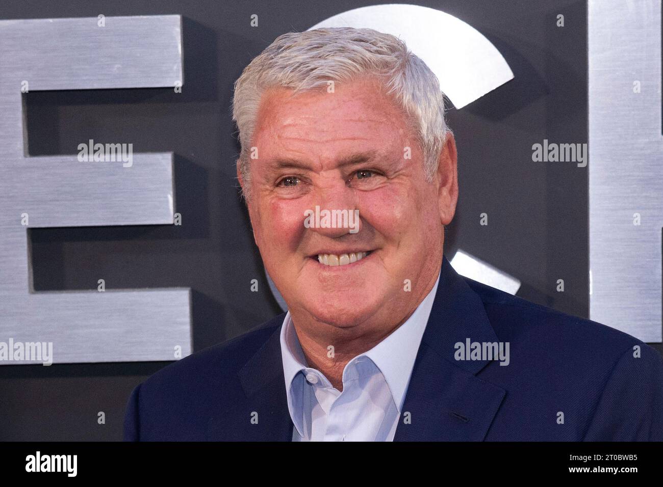 Steve Bruce and wife Janet Bruce pose for photographers upon arrival at ...