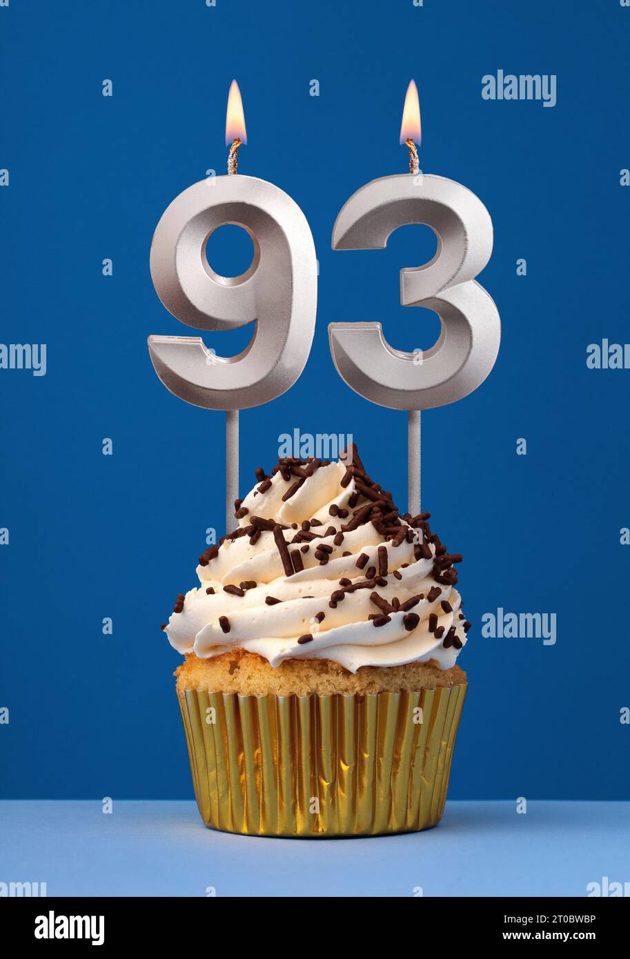 Burning candle number 93 - Birthday card with cake on blue Background ...
