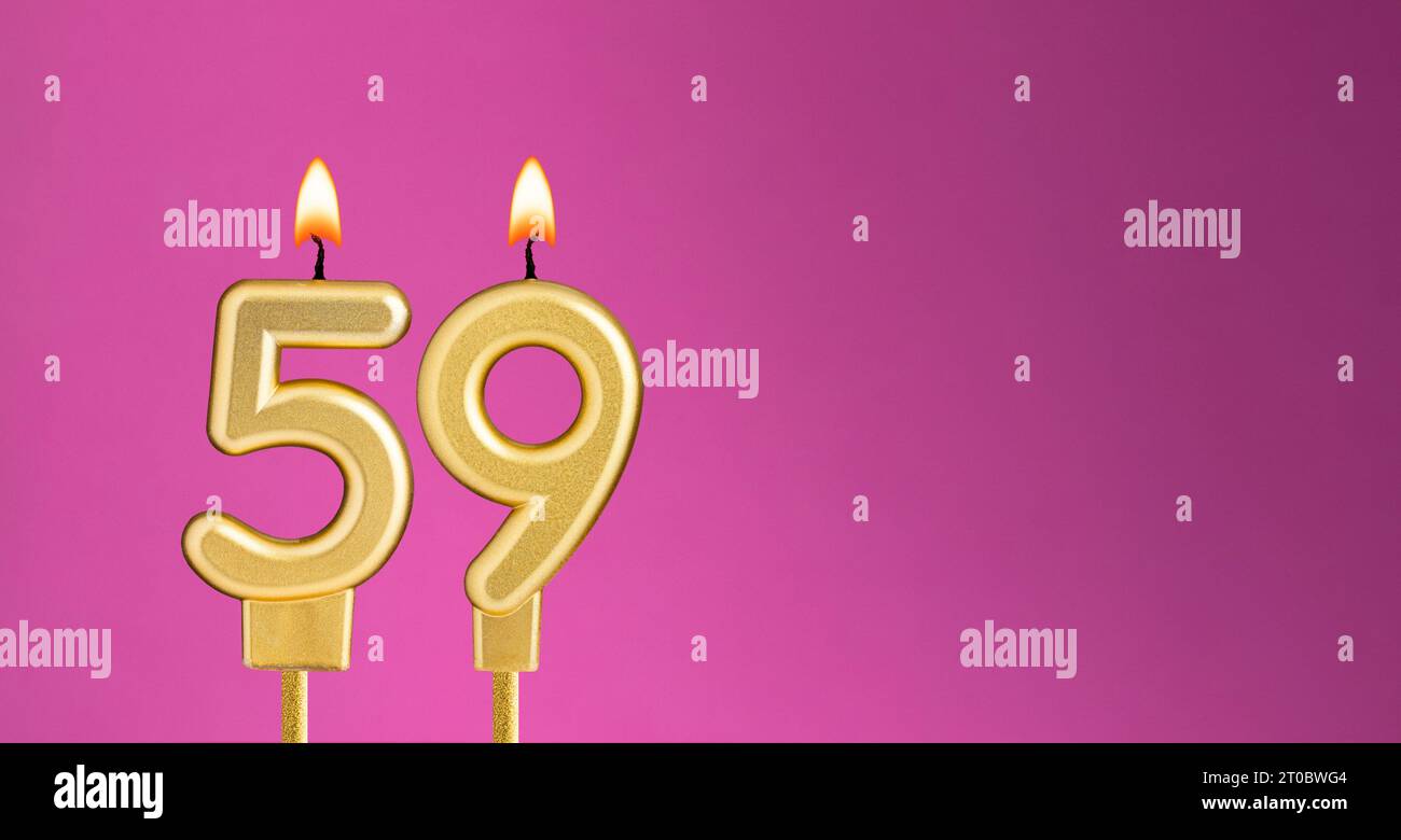 Candle number 59 in purple background - birthday card Stock Photo - Alamy