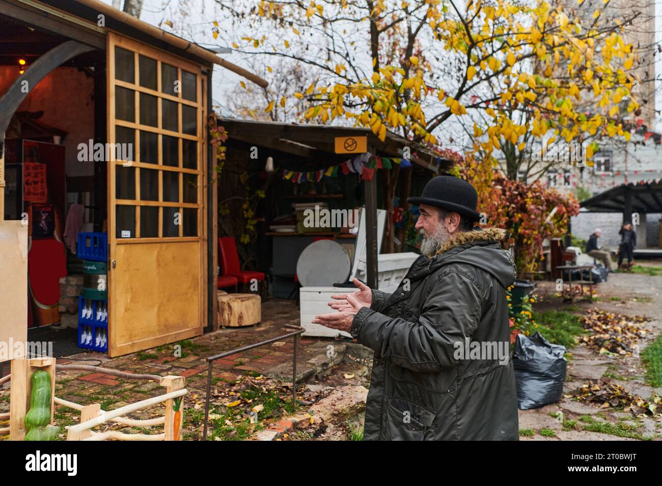 In the historic city of Riga, a bearded elderly man passionately ...