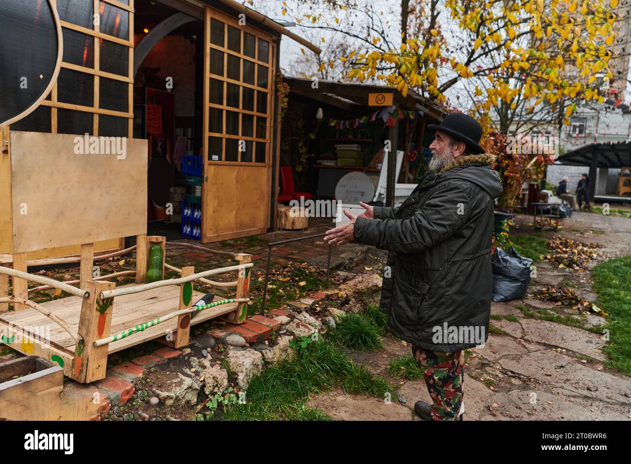 In the historic city of Riga, a bearded elderly man passionately ...