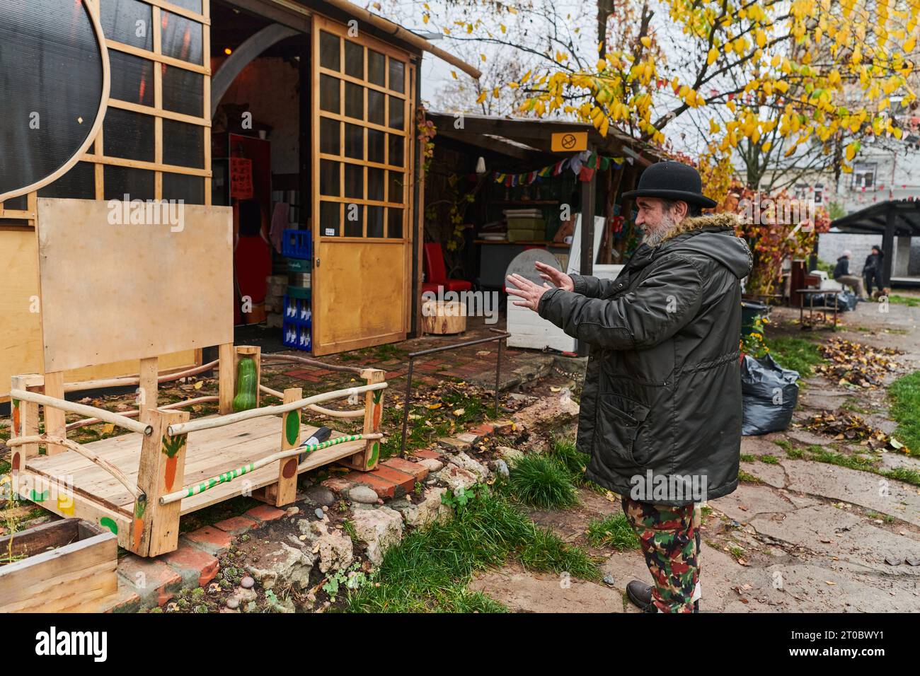 In the historic city of Riga, a bearded elderly man passionately ...